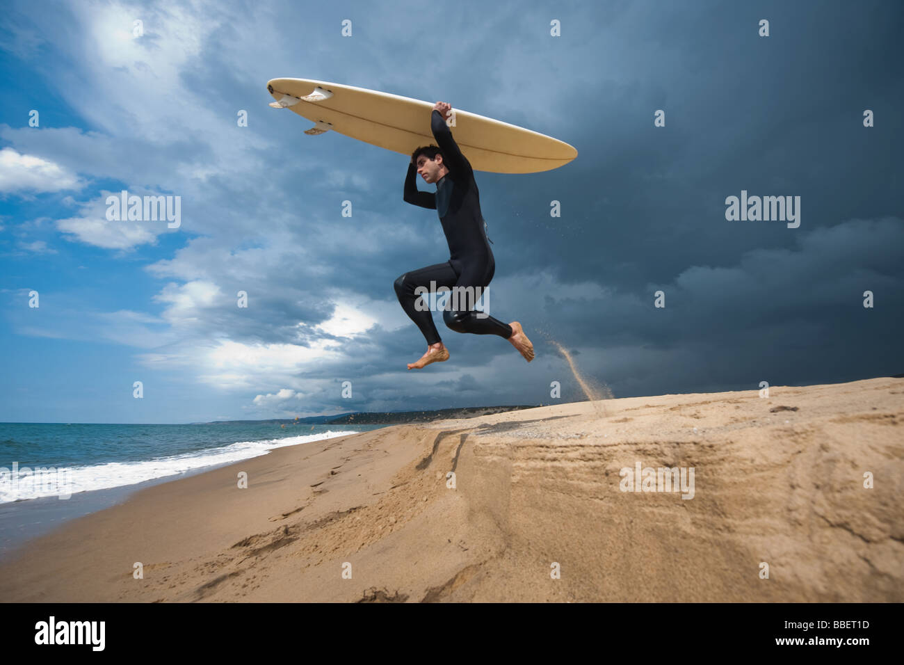 Surfer with surfboard Stock Photo - Alamy