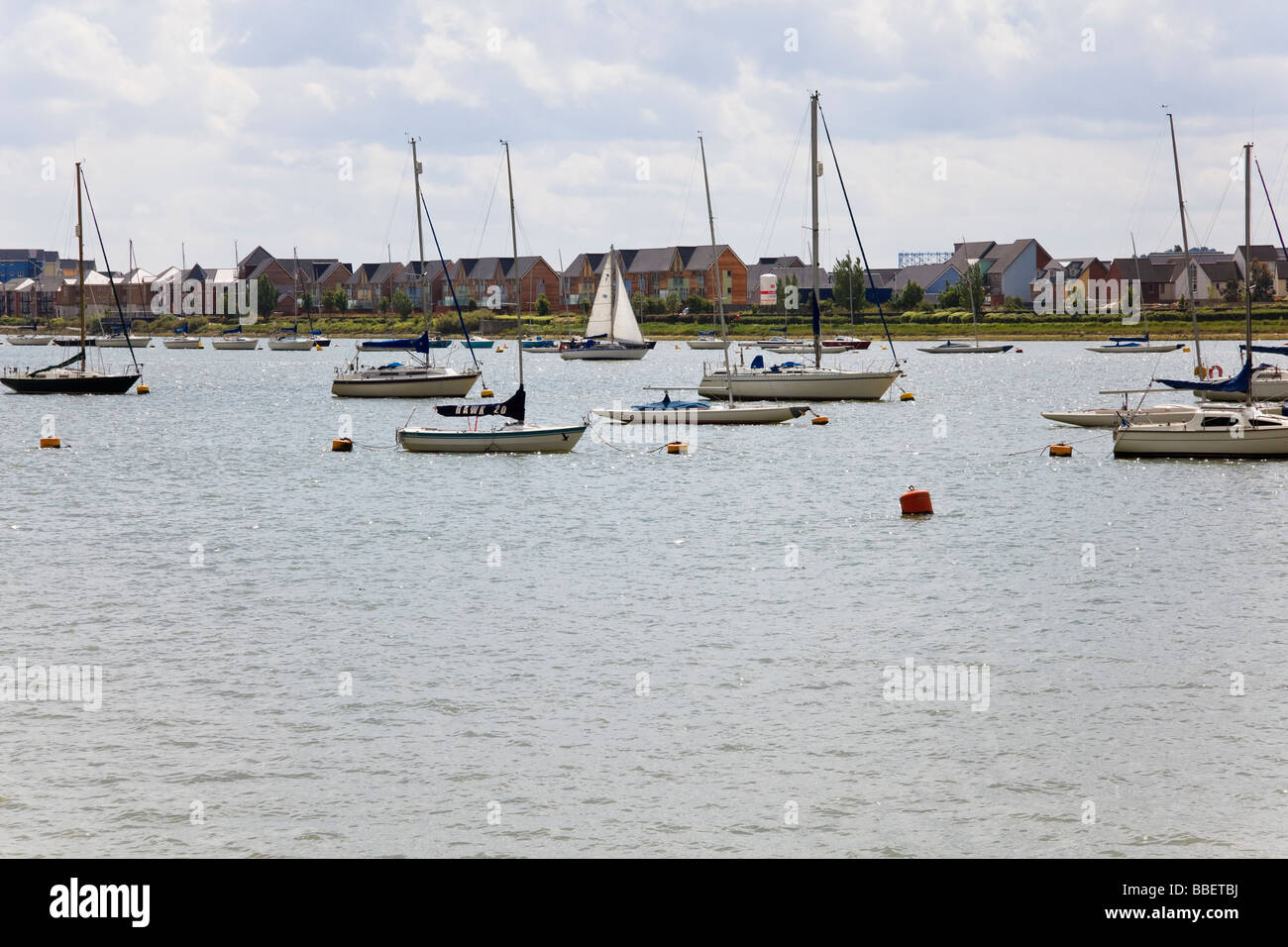 A view across the River Medway from Upnor with moored yachts and ...