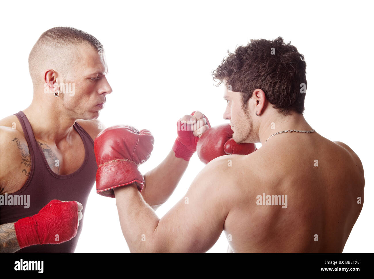 two muscular men boxing isolated on white Stock Photo - Alamy