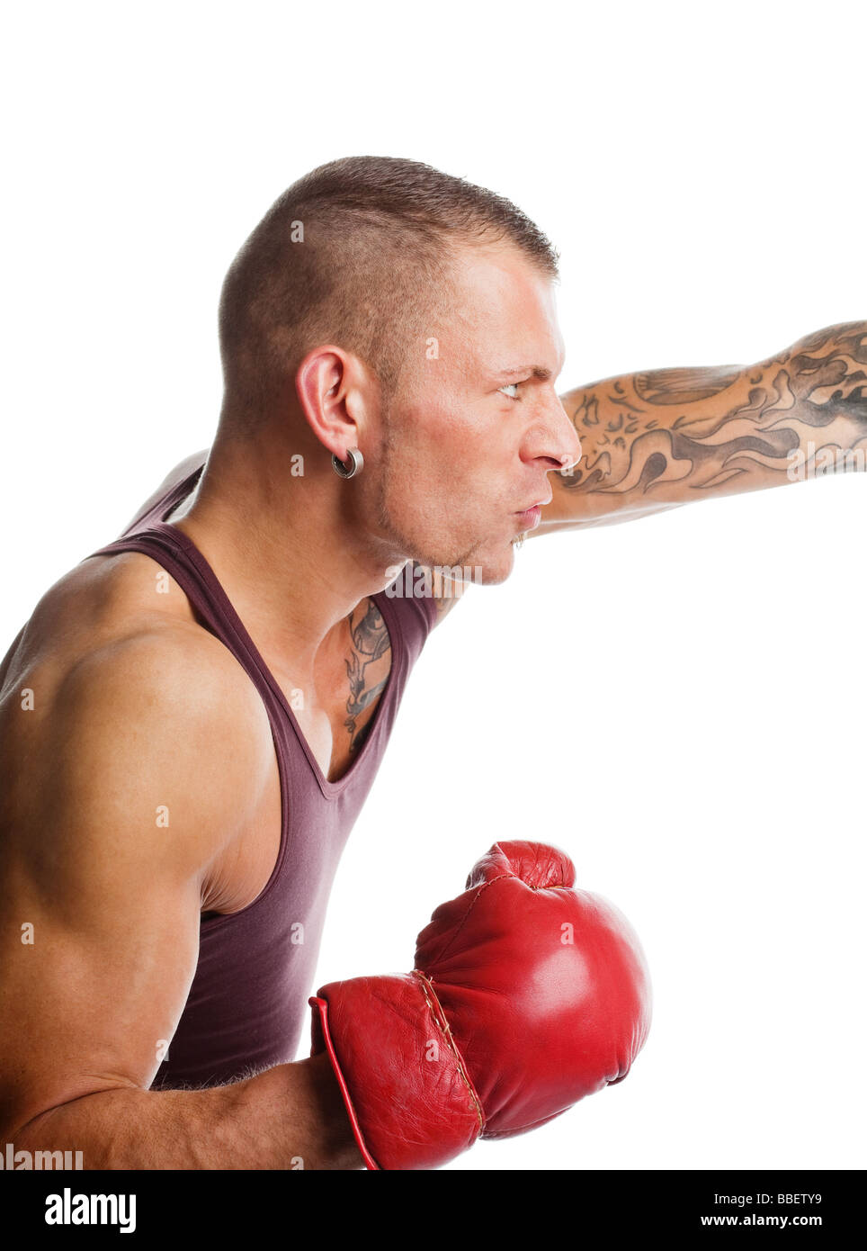 Young muscular man boxing isolated on white background Stock Photo - Alamy