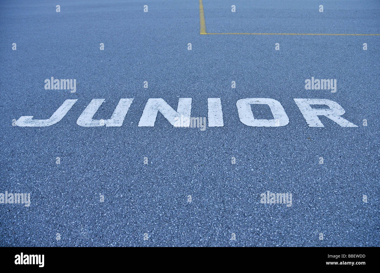 'Junior' Painted on the Pavement of a School Playground Stock Photo - Alamy