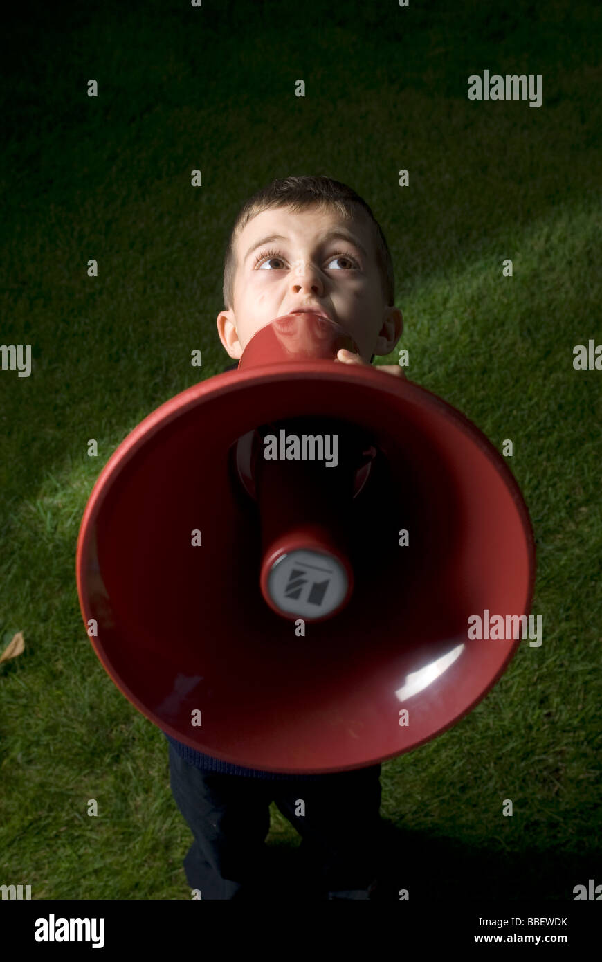 Little Boy Yelling into a Megaphone Stock Photo - Alamy