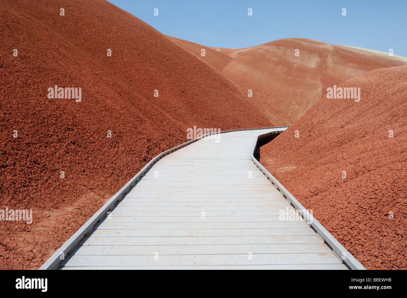 Boardwalk through red claystone hills of the Painted Cove Trail at the ...