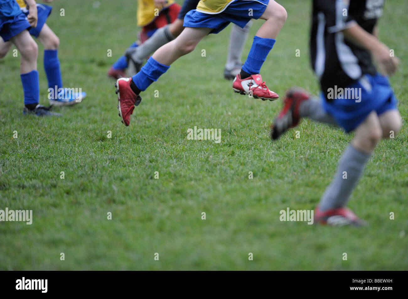 Soccer team running during practice Stock Photo - Alamy