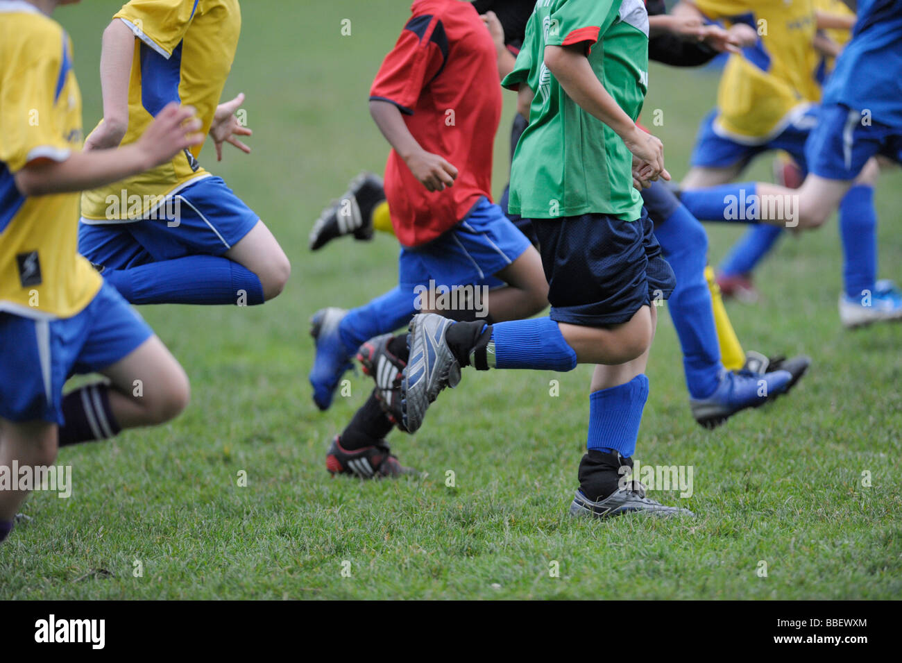 Soccer team running during practice Stock Photo - Alamy