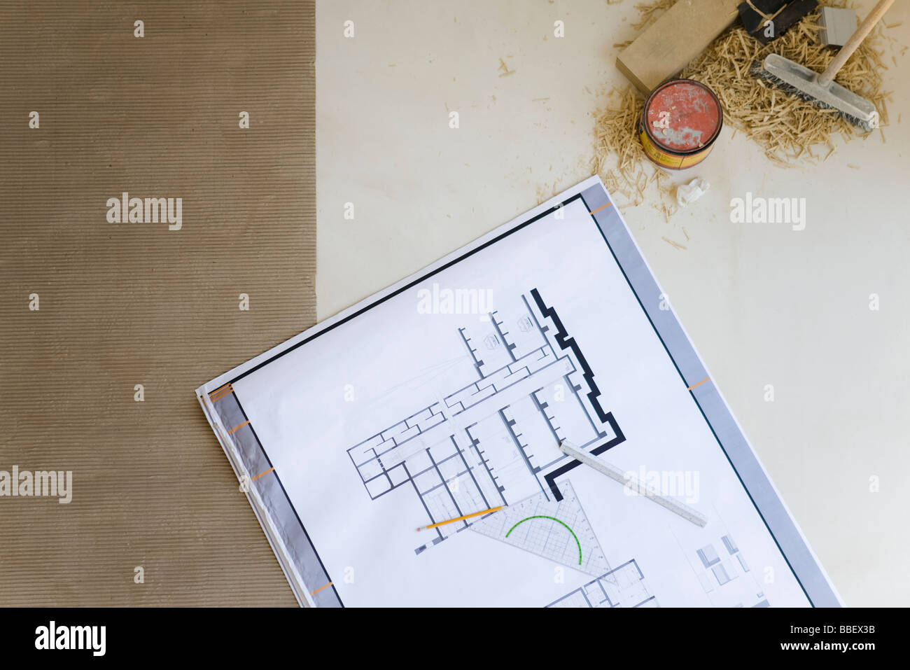 Blueprint spread out on floor Stock Photo - Alamy