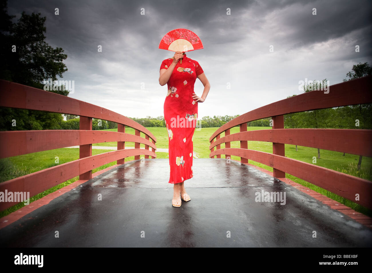 Woman cheongsam one person bridge hi-res stock photography and images ...