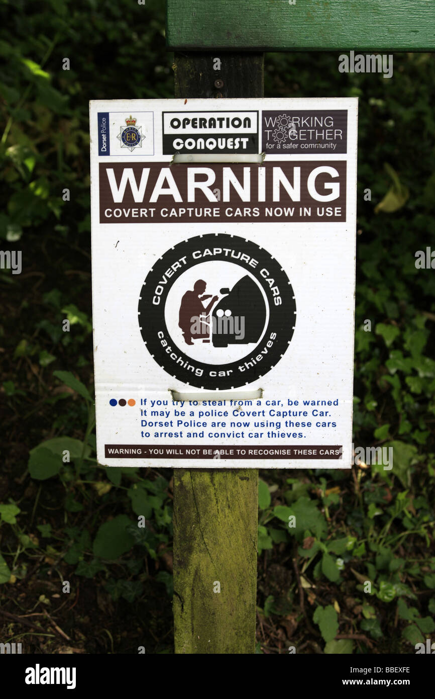 Police sign informing criminals of covert operations Stock Photo - Alamy