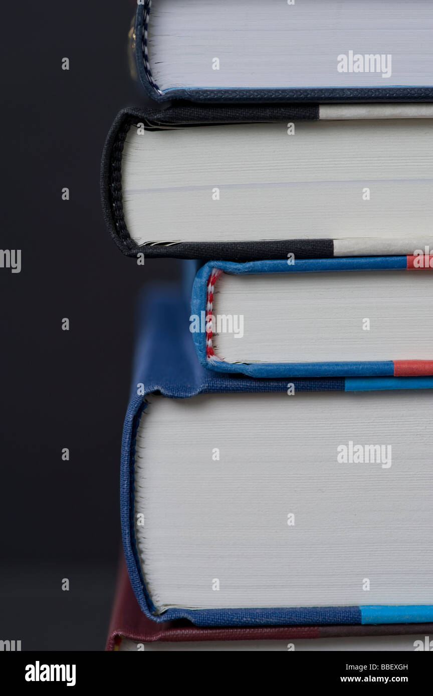 Stack of books on a black background Stock Photo - Alamy