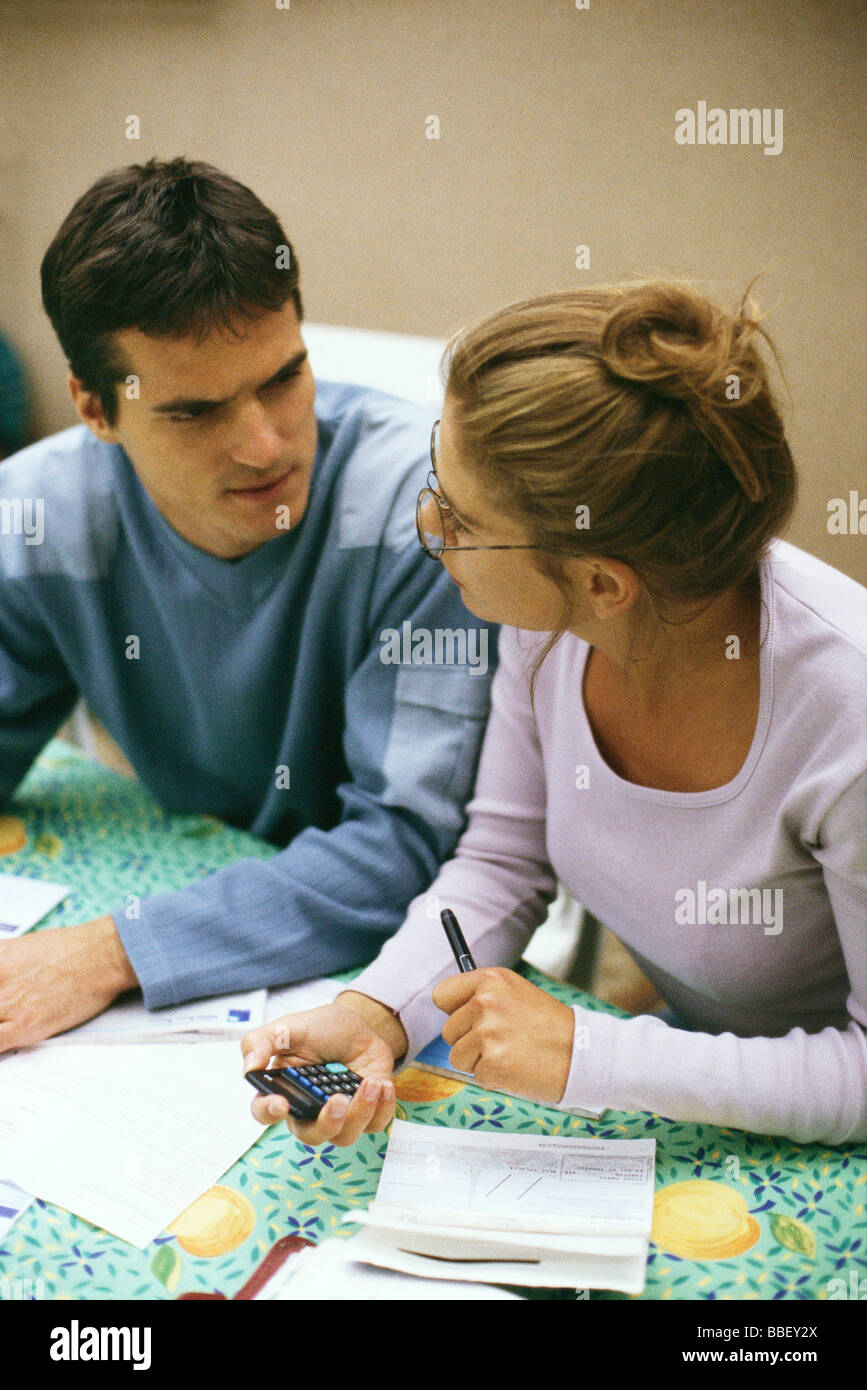 Couple discussing finances together Stock Photo - Alamy
