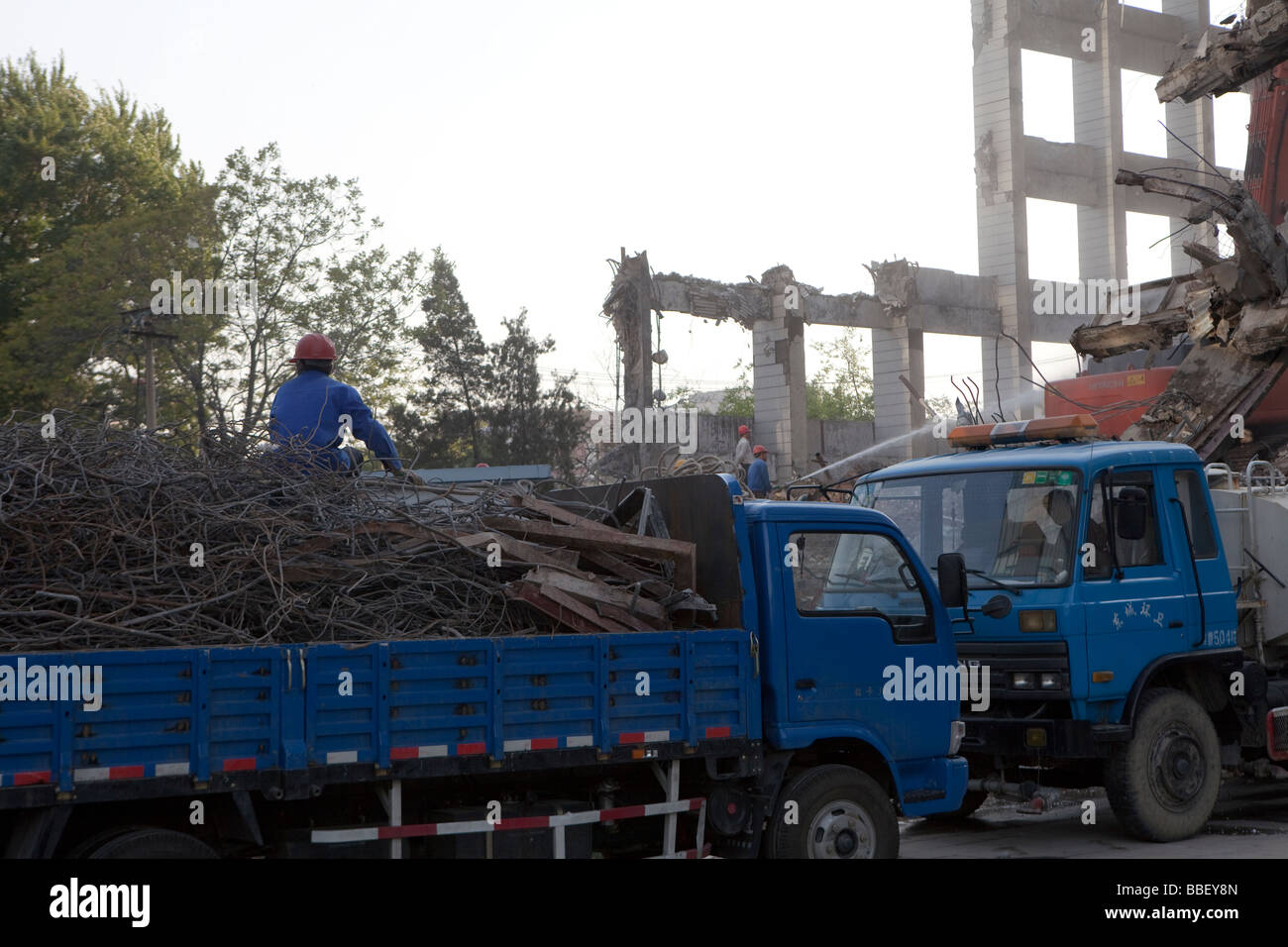 A building is torn down in Beijing China Stock Photo - Alamy