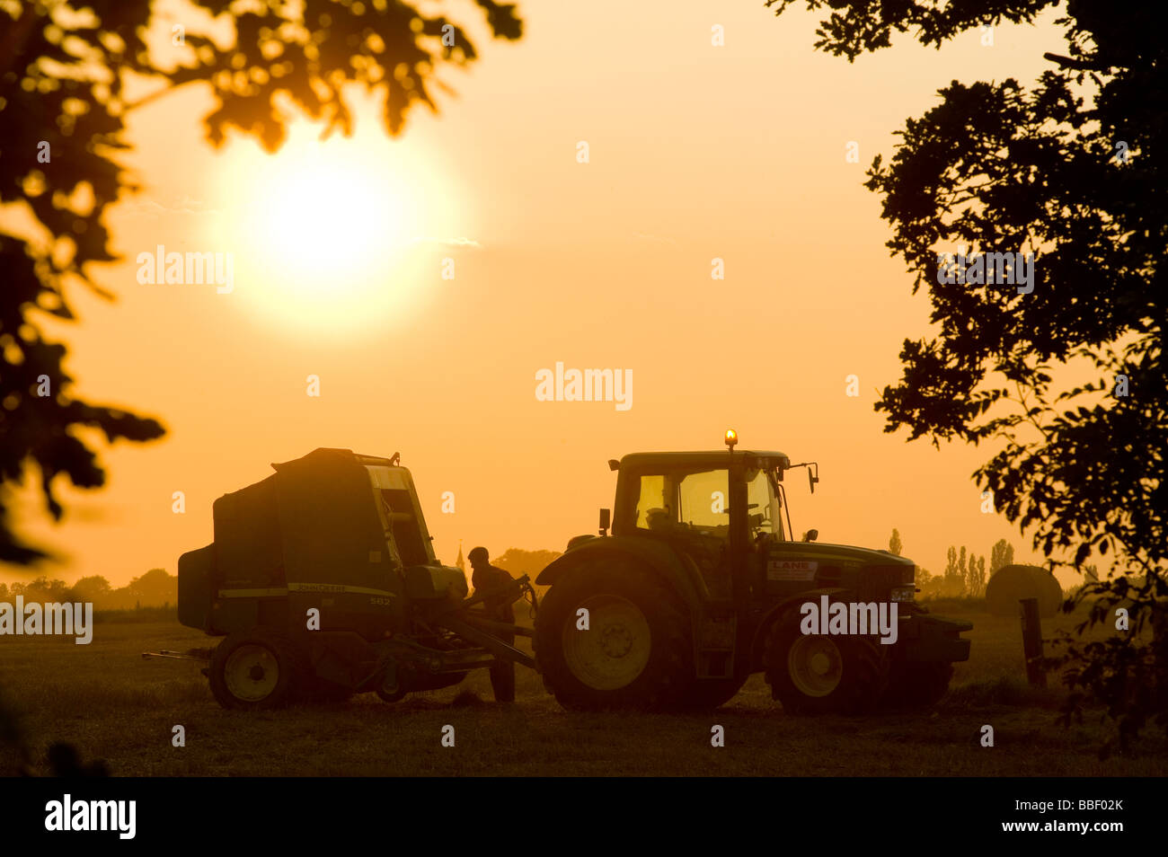 Farmer driving a john deere tractor hi-res stock photography and images ...