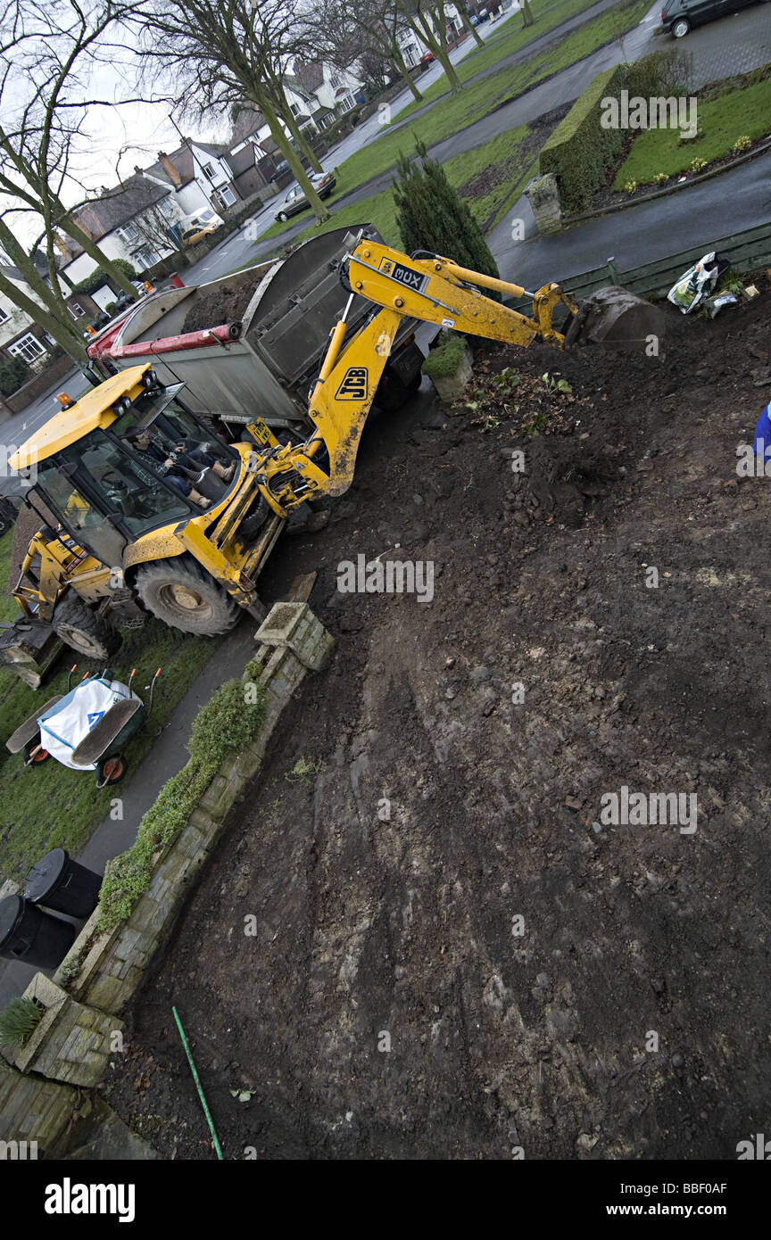 jcb digger digging driveway preparing driveway for slabs Stock Photo ...