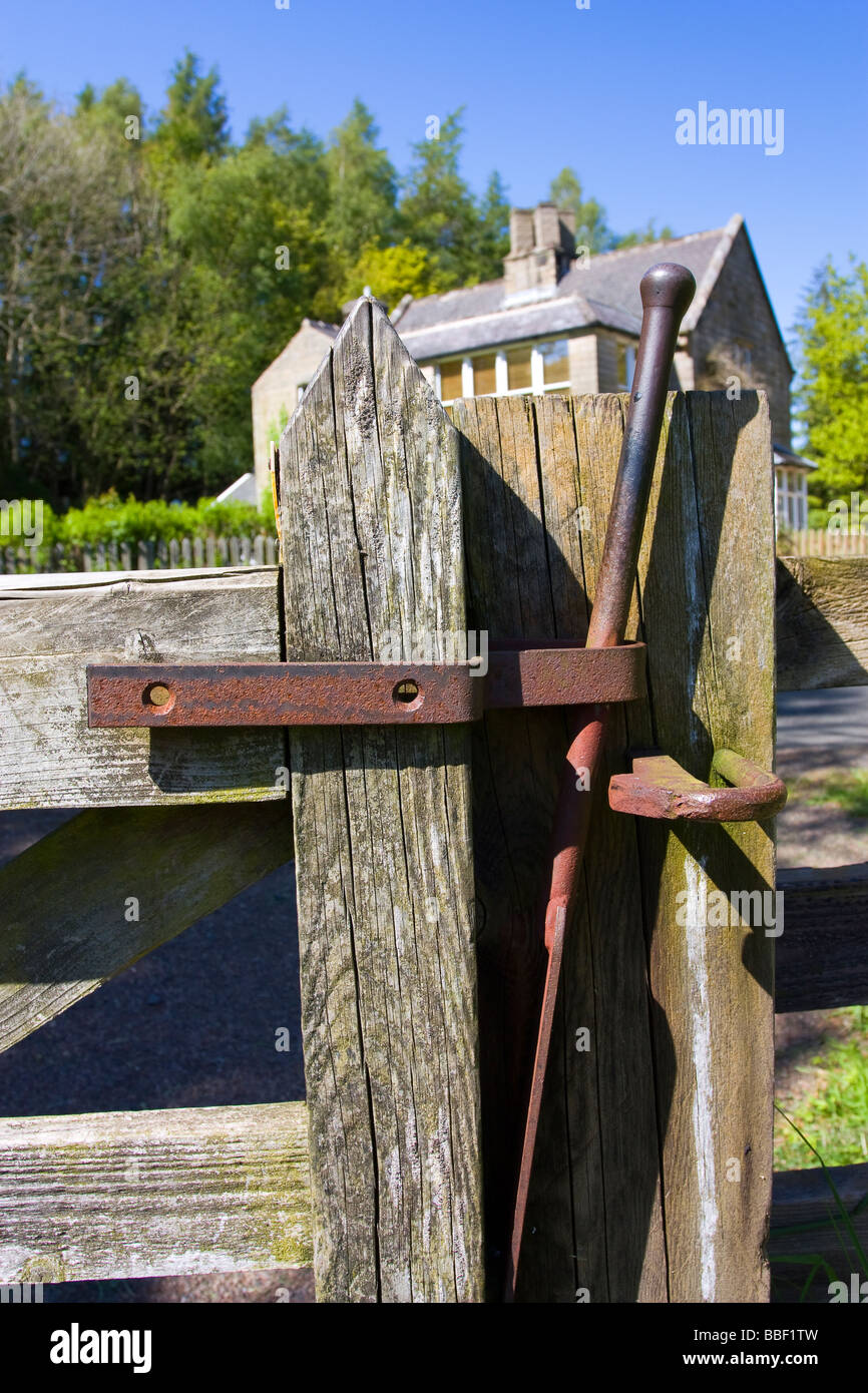 Portrait view of Old Wooden five bar gate rusty hasp catch on the South ...