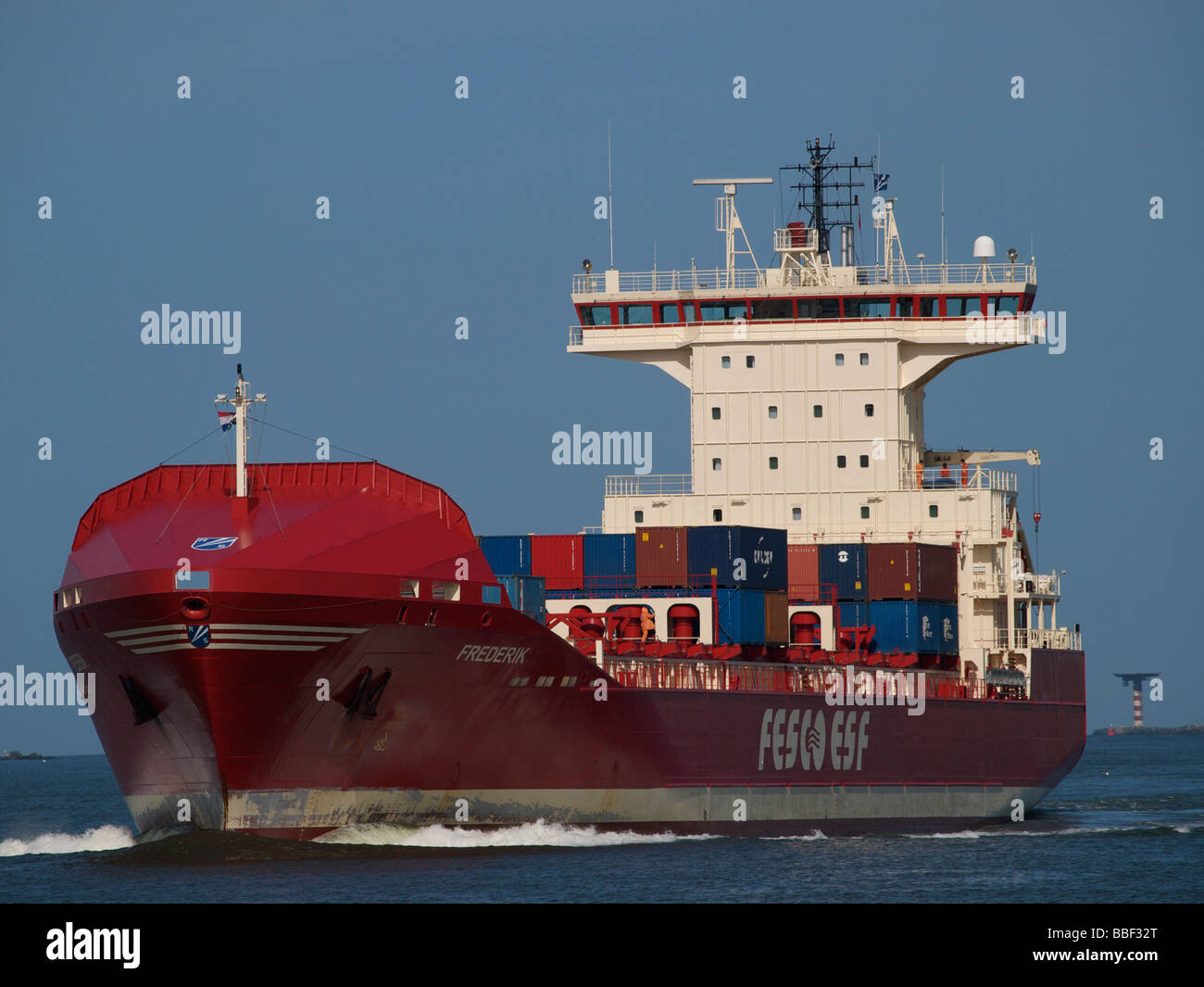 Container ship Frederik steaming inland and approaching the port of ...