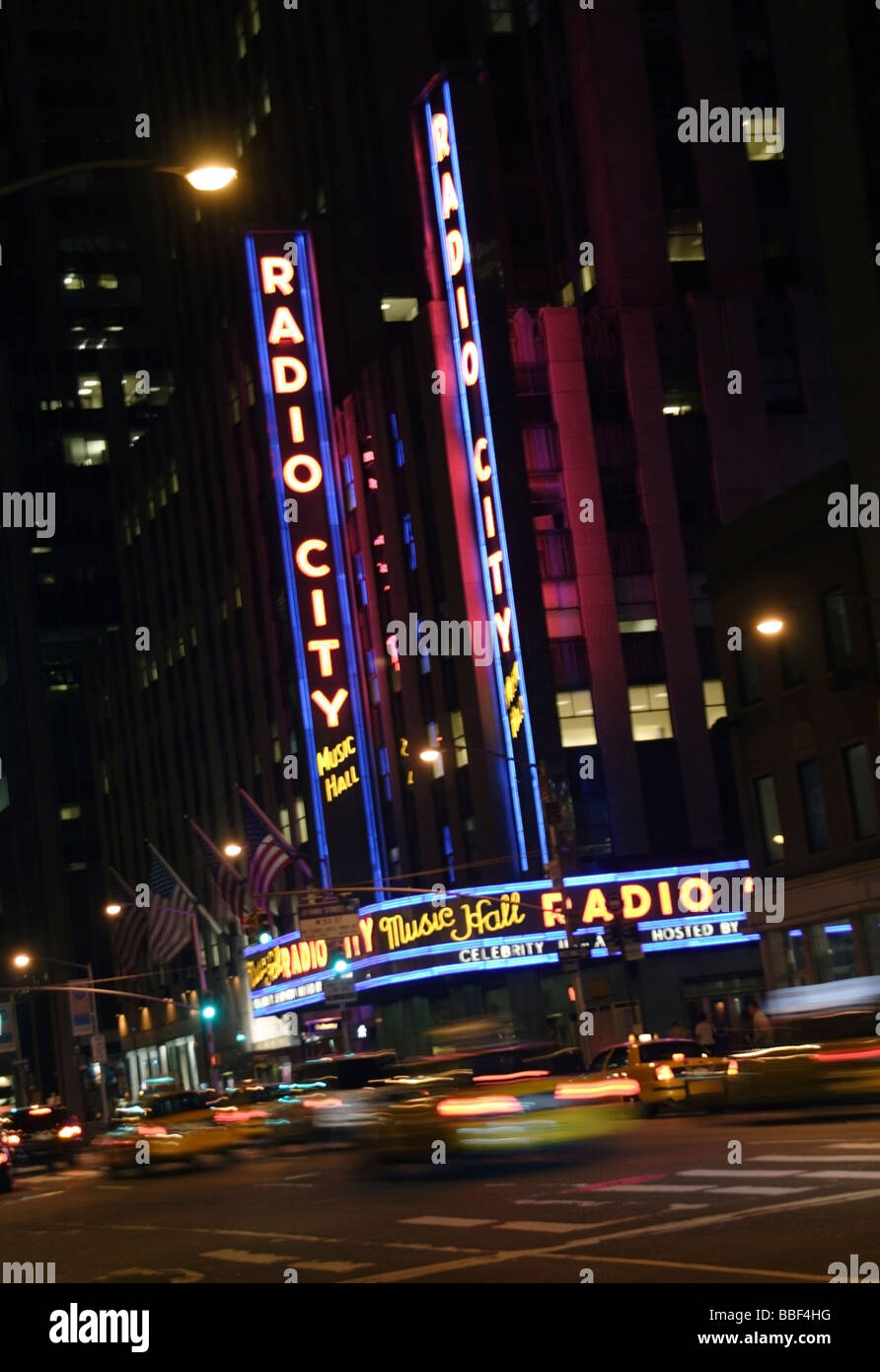 Radio City Music Hall, Manhattan, New York City, USA; Traffic going by ...