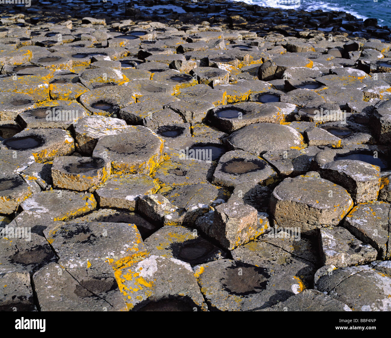 Hexagonal shapes create a puzzle of these basalt columns at Northern ...
