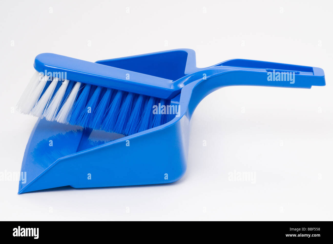 A blue dust pan and brush Stock Photo - Alamy