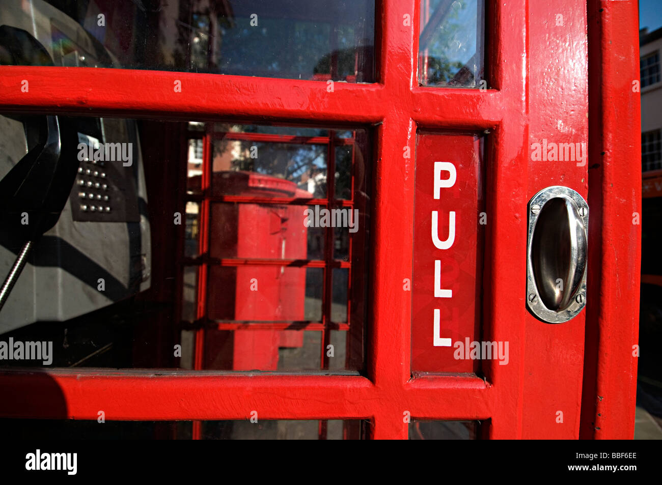 a red telephone box in nottingham will pull written on the box Stock ...