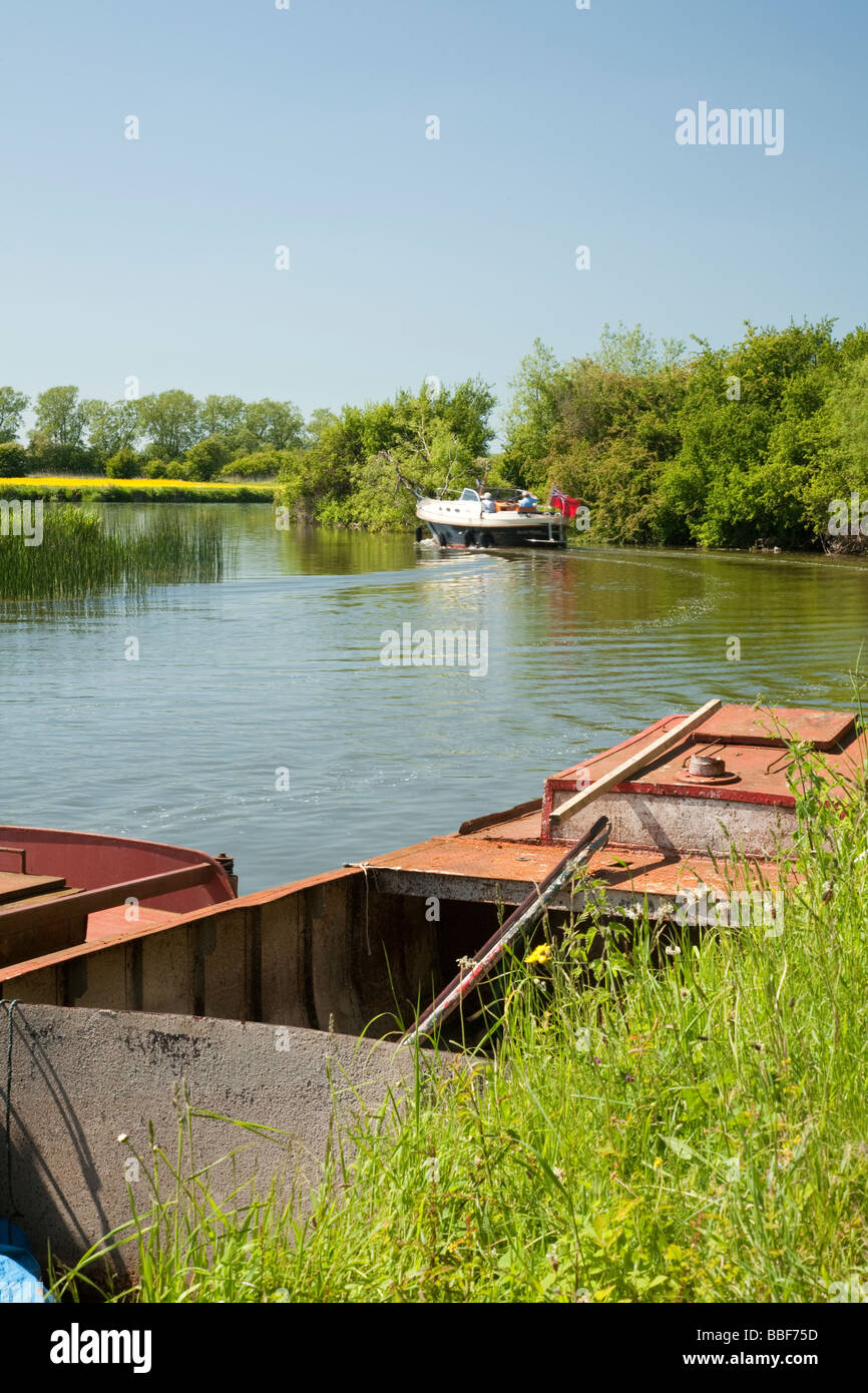Pleasure boat on the upper reaches of the River Thames upstream of ...