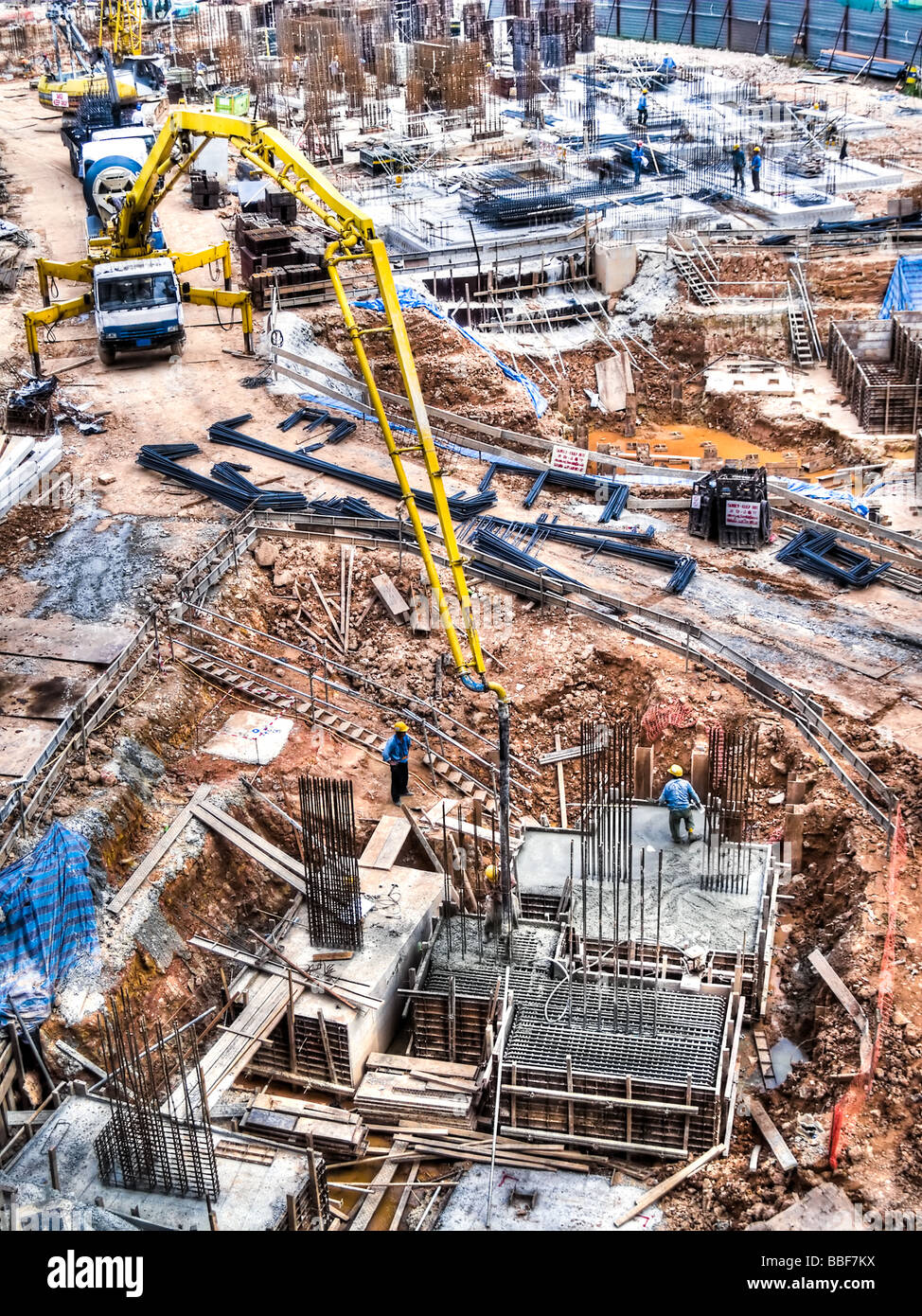 Concrete Pump Operating in Work Site Stock Photo - Alamy