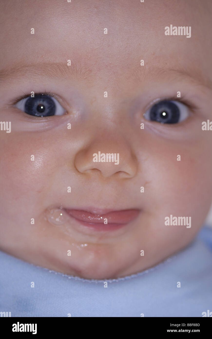 Baby blowing bubbles Stock Photo - Alamy