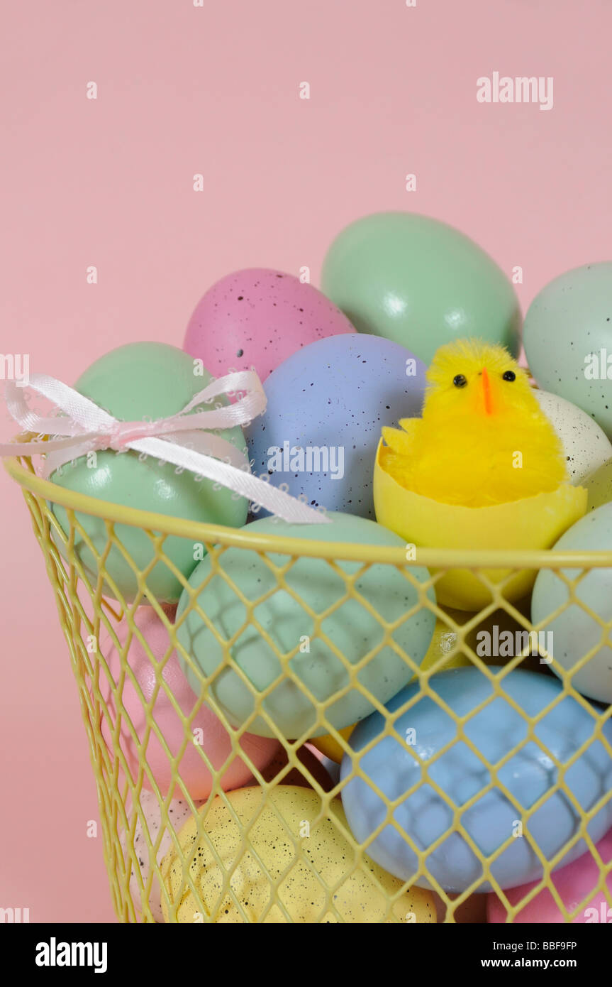 Easter Eggs in Yellow Wire Mesh Basket Stock Photo - Alamy