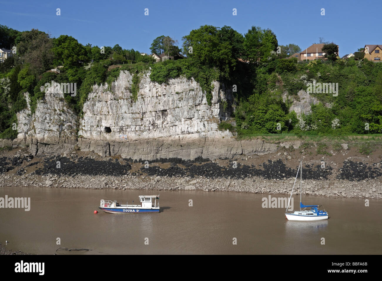 River Wye at Chepstow, Wales UK at low tide Limestone cliffs English ...