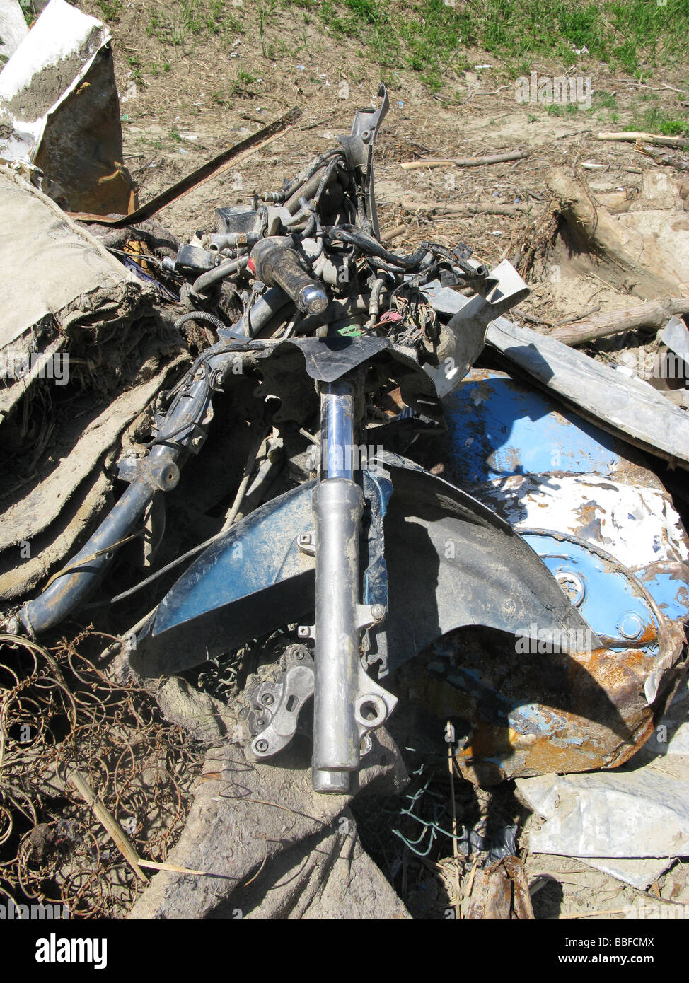 old scooter motorbike dumped on derelict ground Stock Photo - Alamy