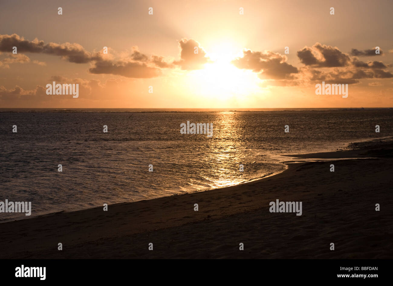 Sun shining through Clouds at Sunset South Pacific Ocean Rarotonga Cook ...