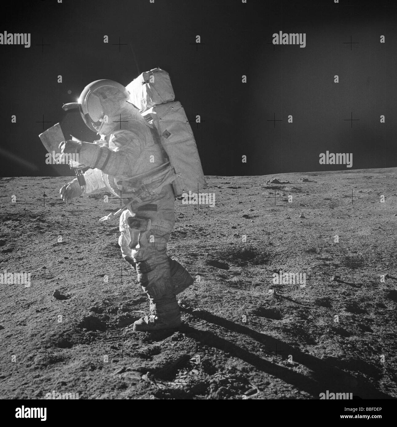 NASA astronaut exploring Moon surface photographed by Apollo 14 crew ...
