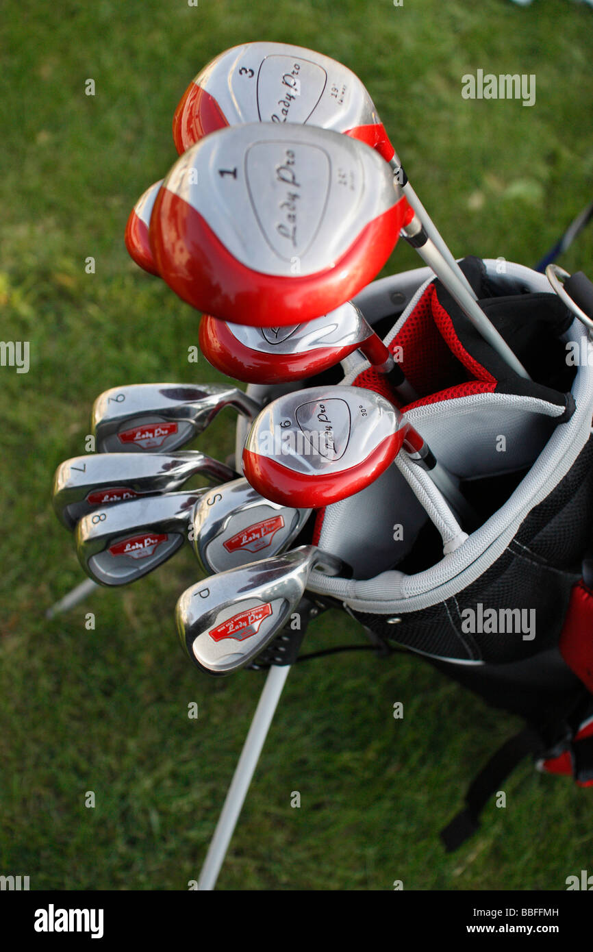 Set of red Golf clubs in a red bag for a woman from above overhead ...
