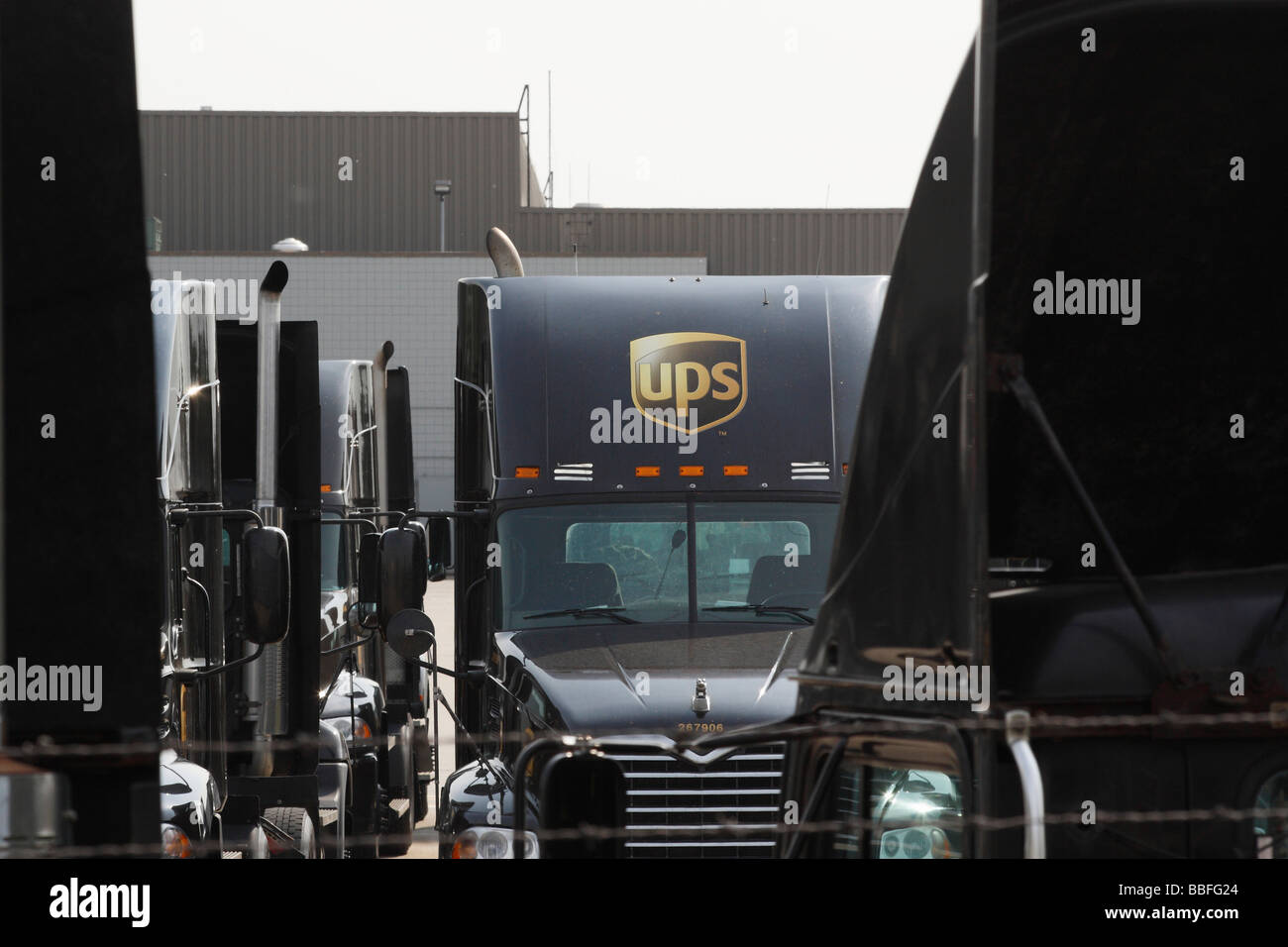 Row of UPS delivery trucks transportation truck logo company shipping ...