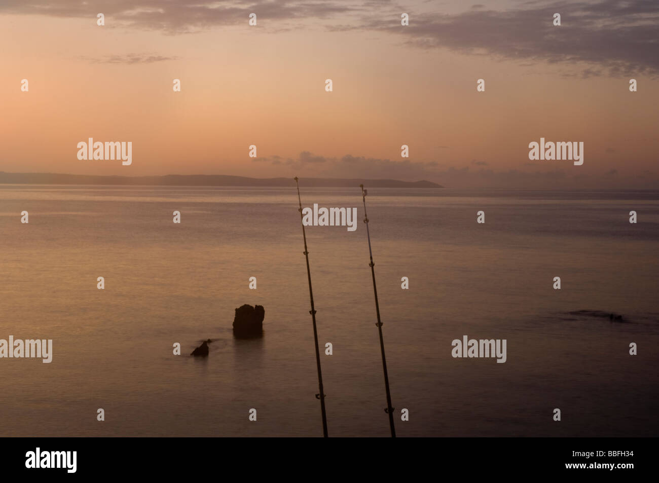 early morning fishing seen at sun rise Stock Photo - Alamy