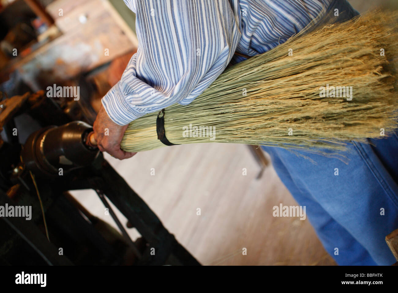 Historic brooms workshop with a craftsman Sauder Village in Ohio USA US ...