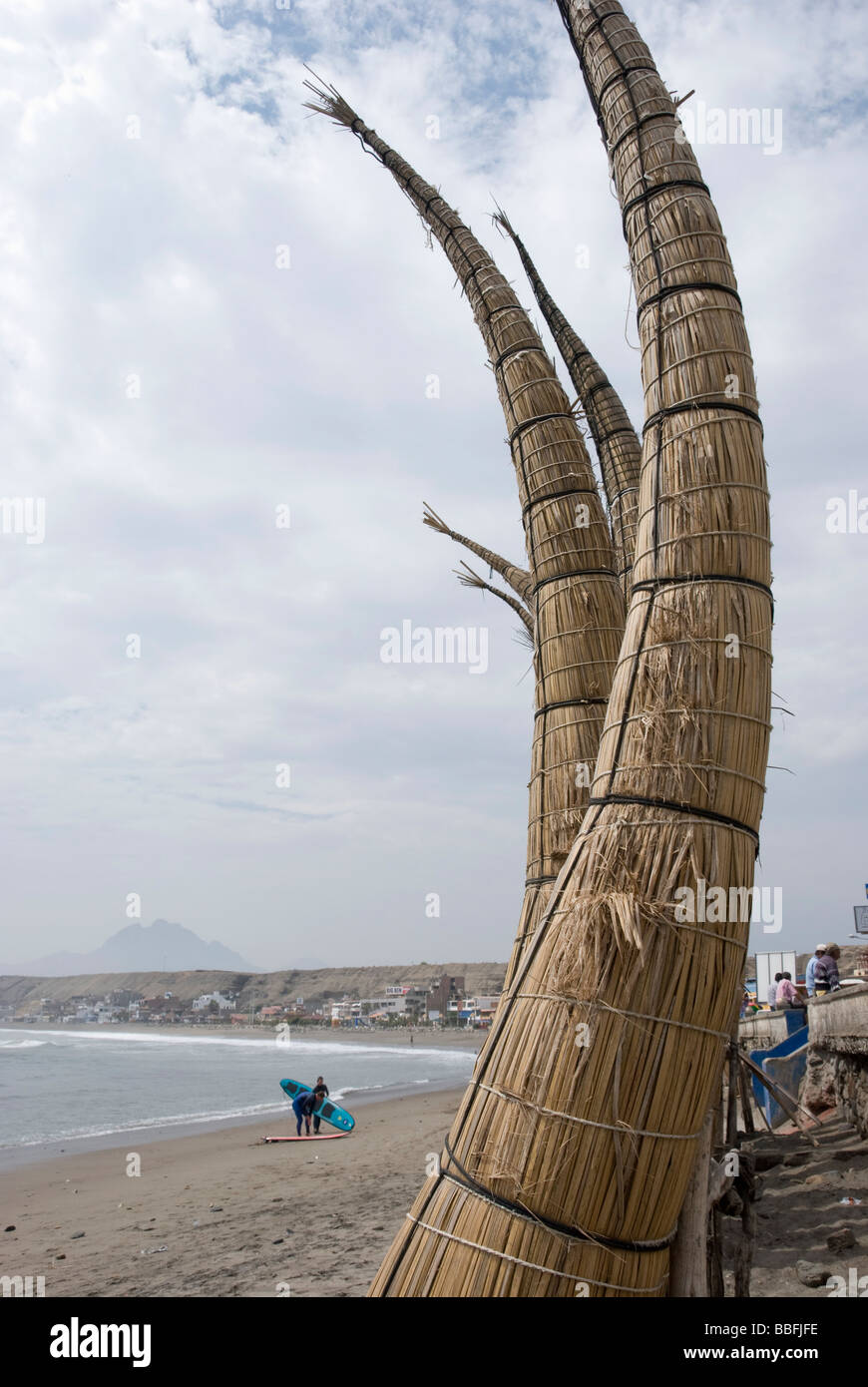 Pointed totora reed rafts surfed on by fishermen. Huanchaco, a beach ...