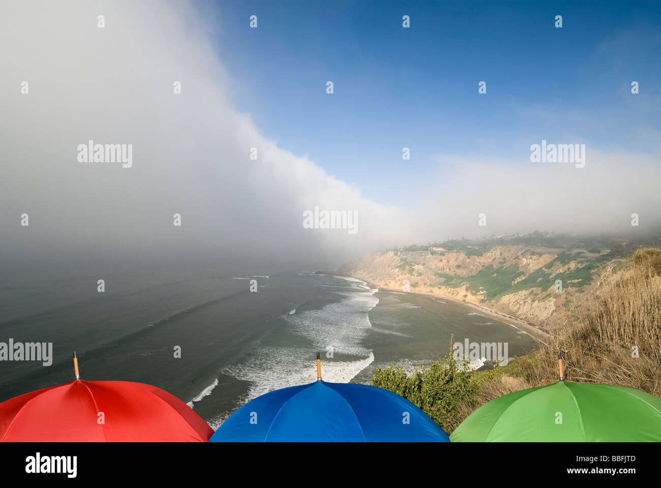 A huge weather front moves in quickly to engulf the sunny shoreline ...