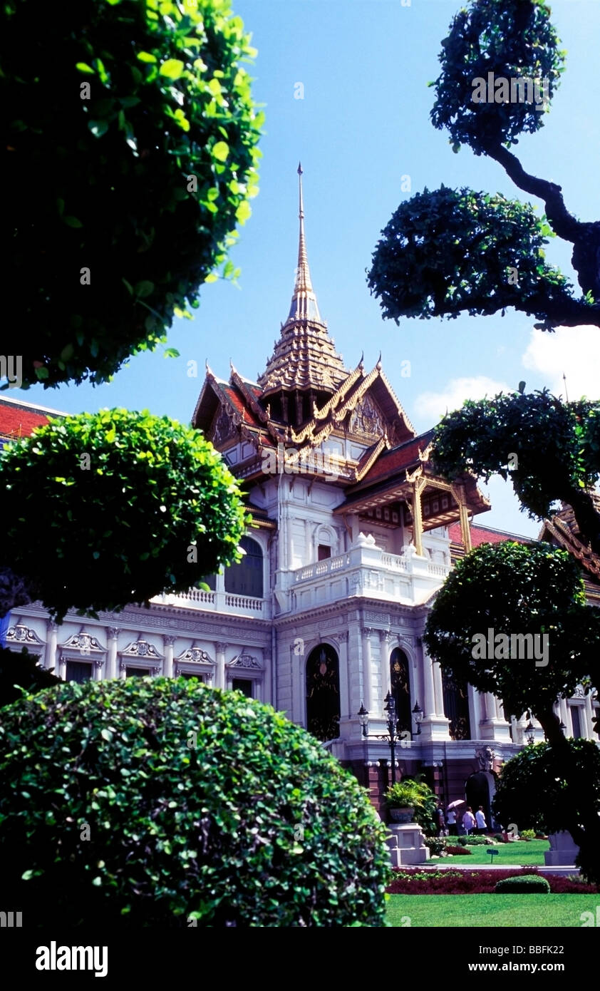 Looking through sculptured trees at the King s palace in Bangkok ...