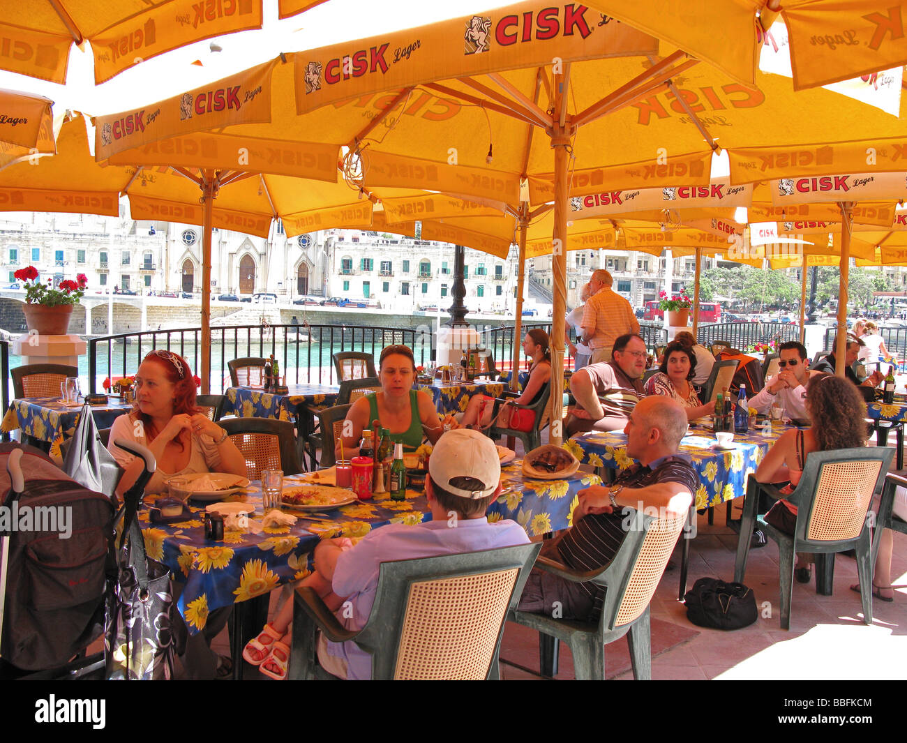 MALTA. An outdoor seafront terrace cafe at Balluta Bay in St. Julian's ...