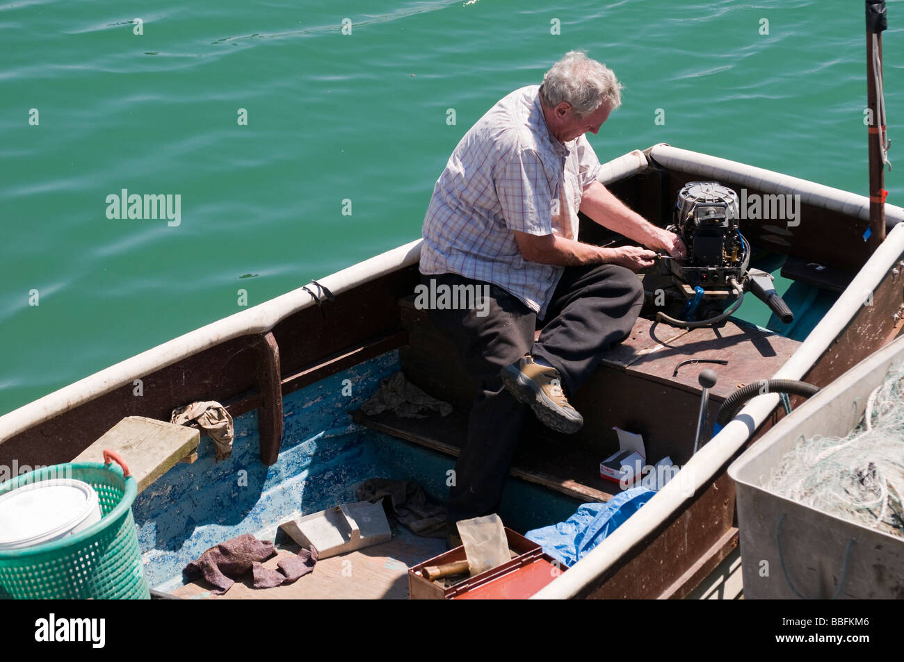Repairing outboard hi-res stock photography and images - Alamy
