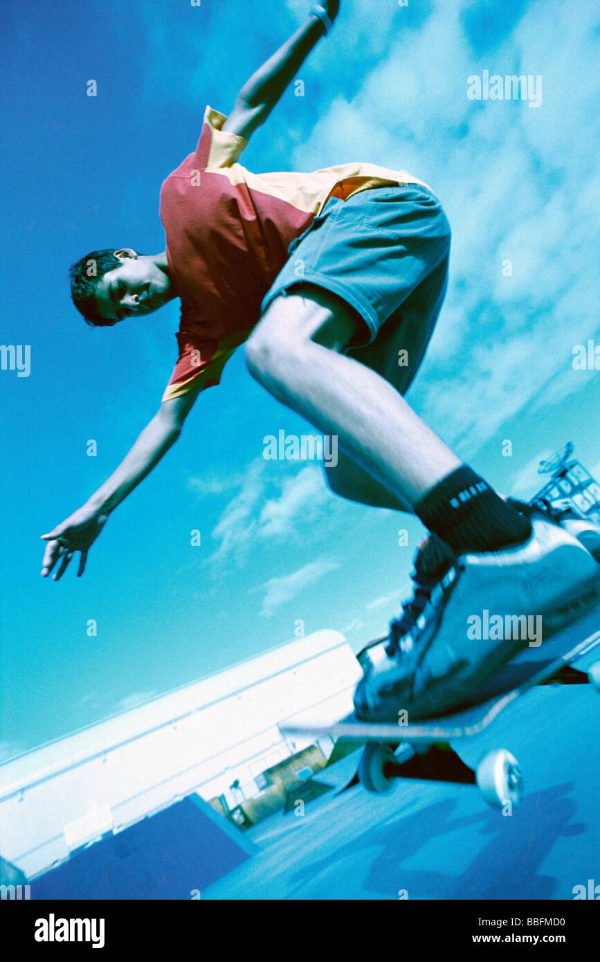 Skateboarders in mid air hi-res stock photography and images - Alamy