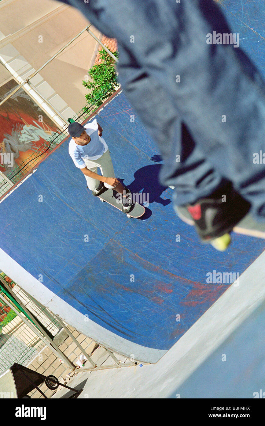 Skaeboarder skating ramp, high angle view Stock Photo - Alamy
