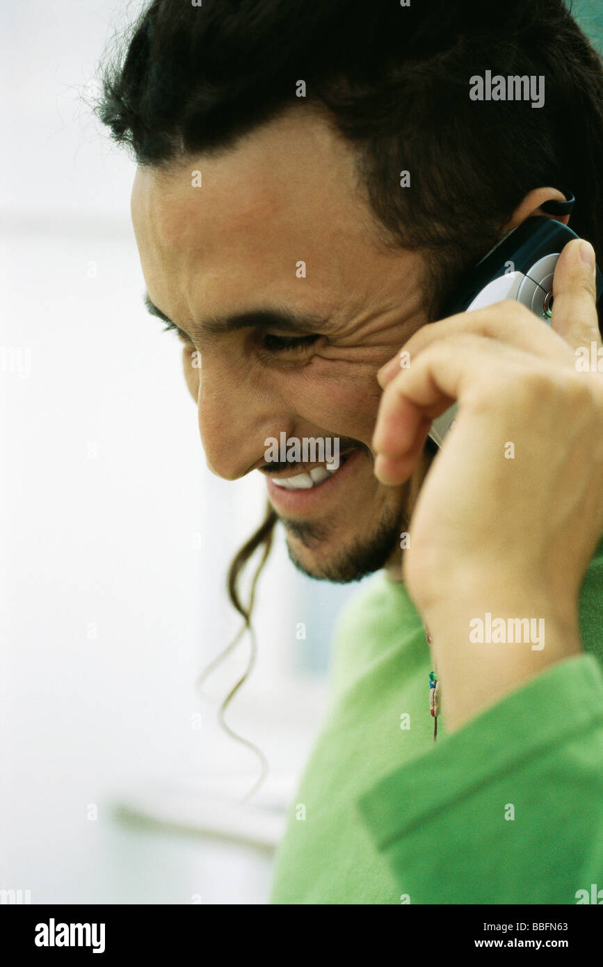 Man phoning, side view, close-up Stock Photo - Alamy