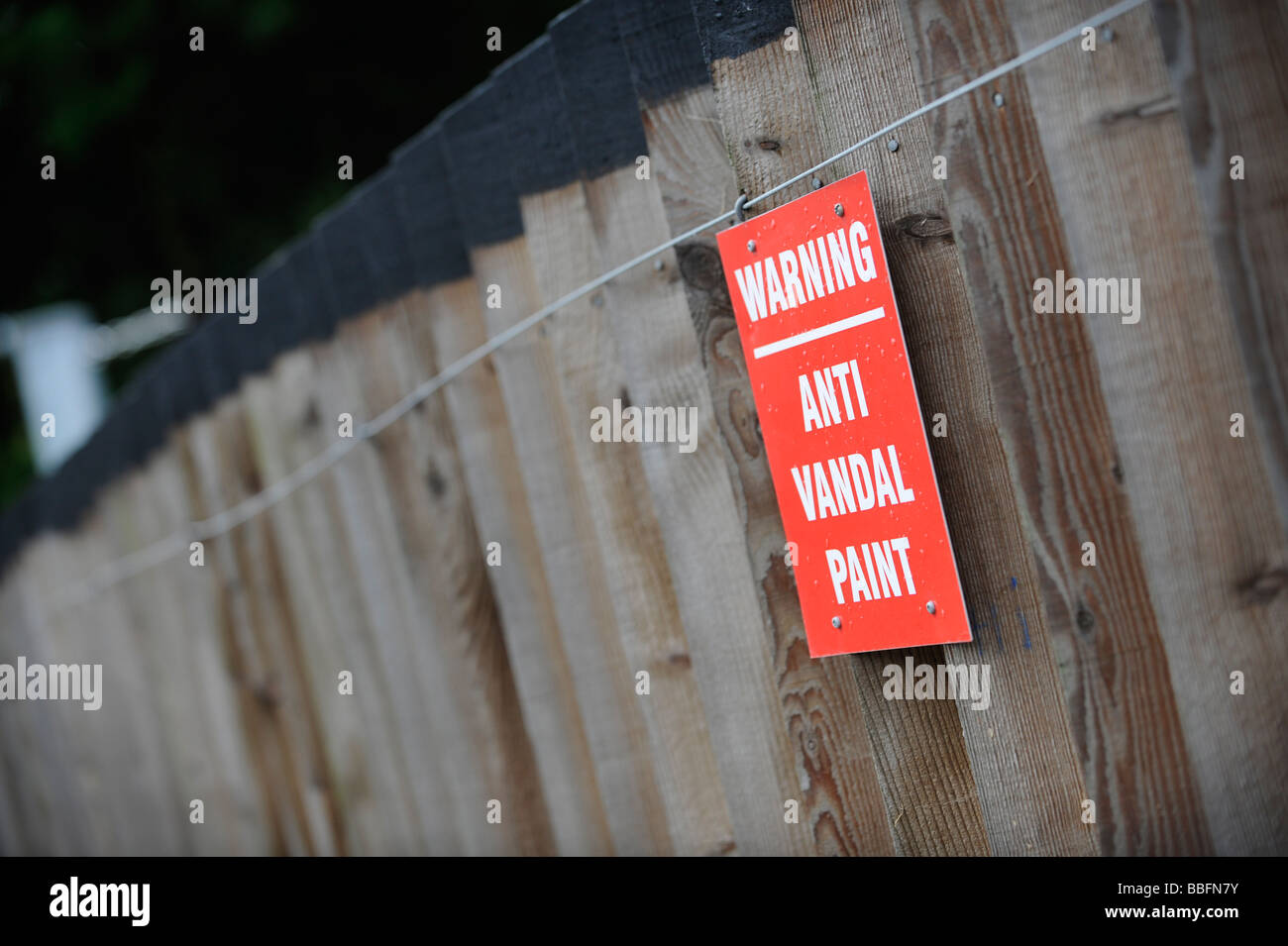 Property owner places anti vandal paint signs on a fence Stock Photo ...