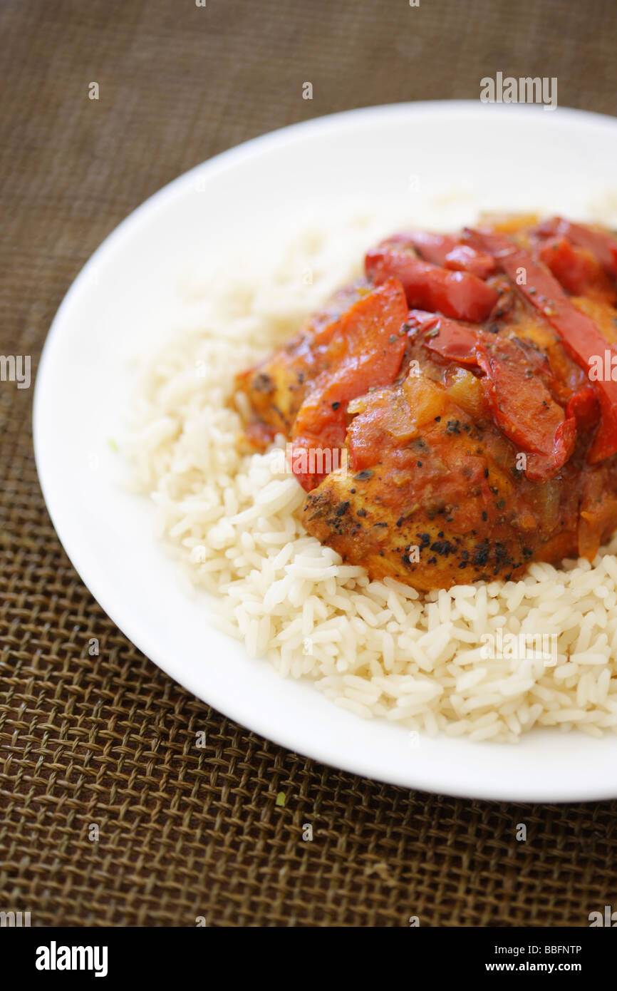 Thai Red Chicken Curry with Peppers and Rice Stock Photo - Alamy