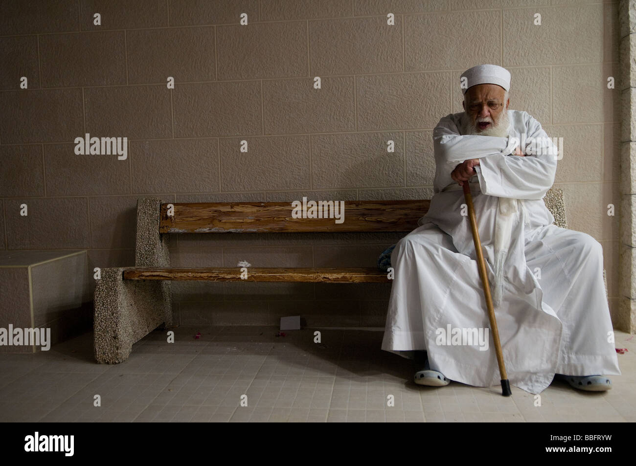 An elder member of the Samaritan sect wears a long white gown in kiryat ...