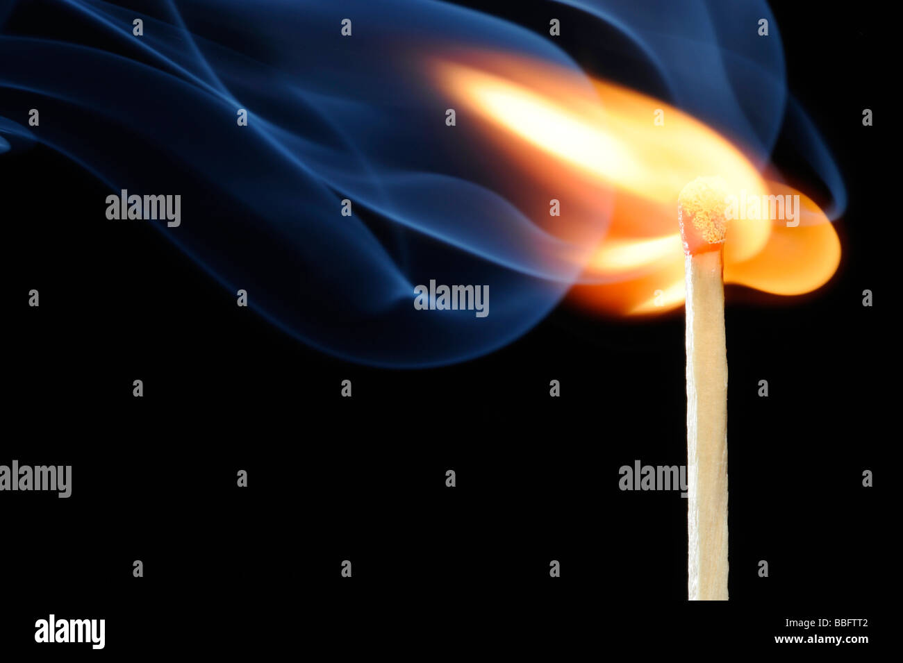 Lit match, flame, blue smoke Stock Photo - Alamy