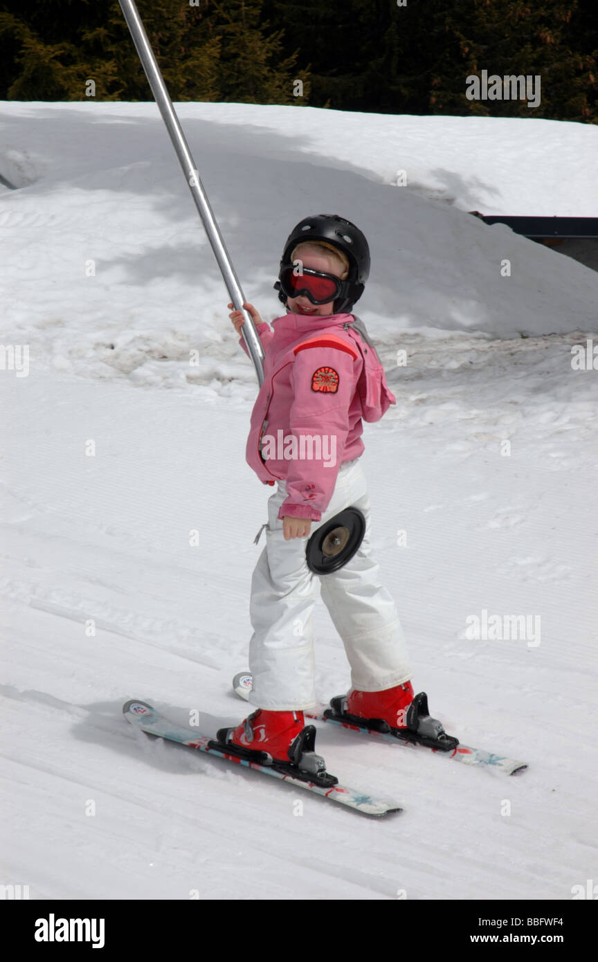 A young girl on a button lift Stock Photo - Alamy
