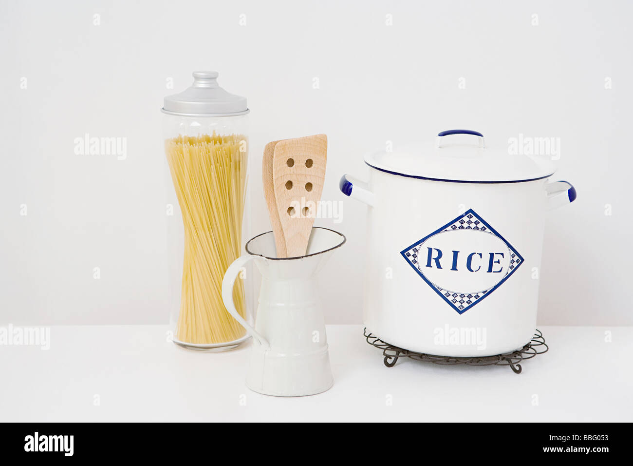 Container of spaghetti and rice Stock Photo - Alamy