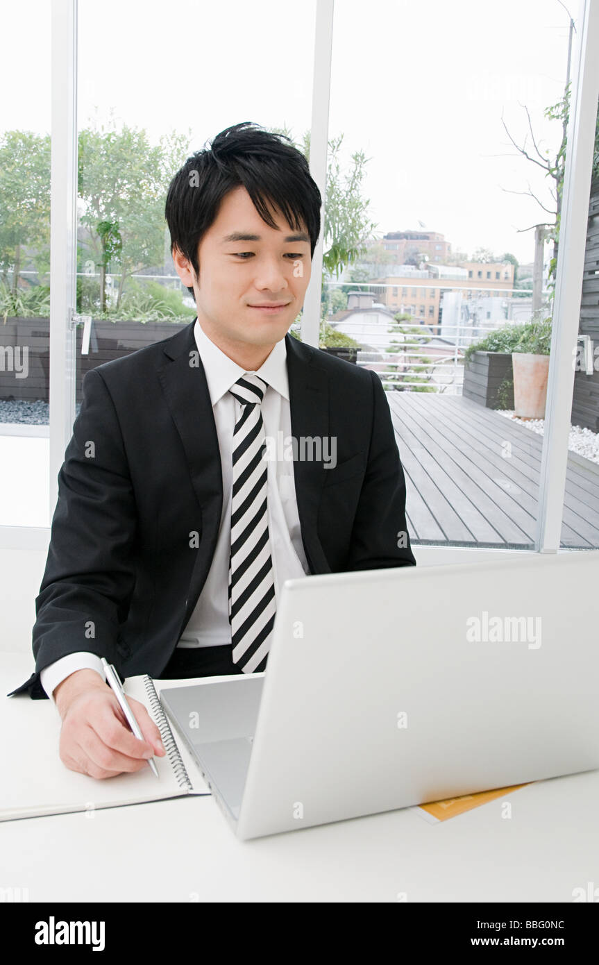 Office window laptop far east hi-res stock photography and images - Alamy